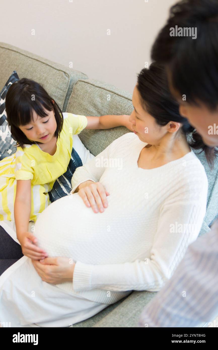 Family waiting for baby Stock Photo - Alamy