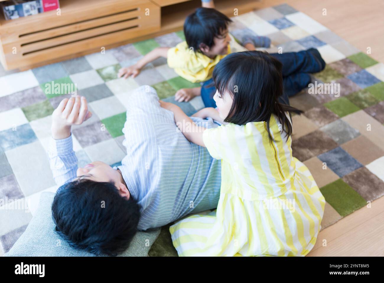 Parent spoiling child hi-res stock photography and images - Alamy