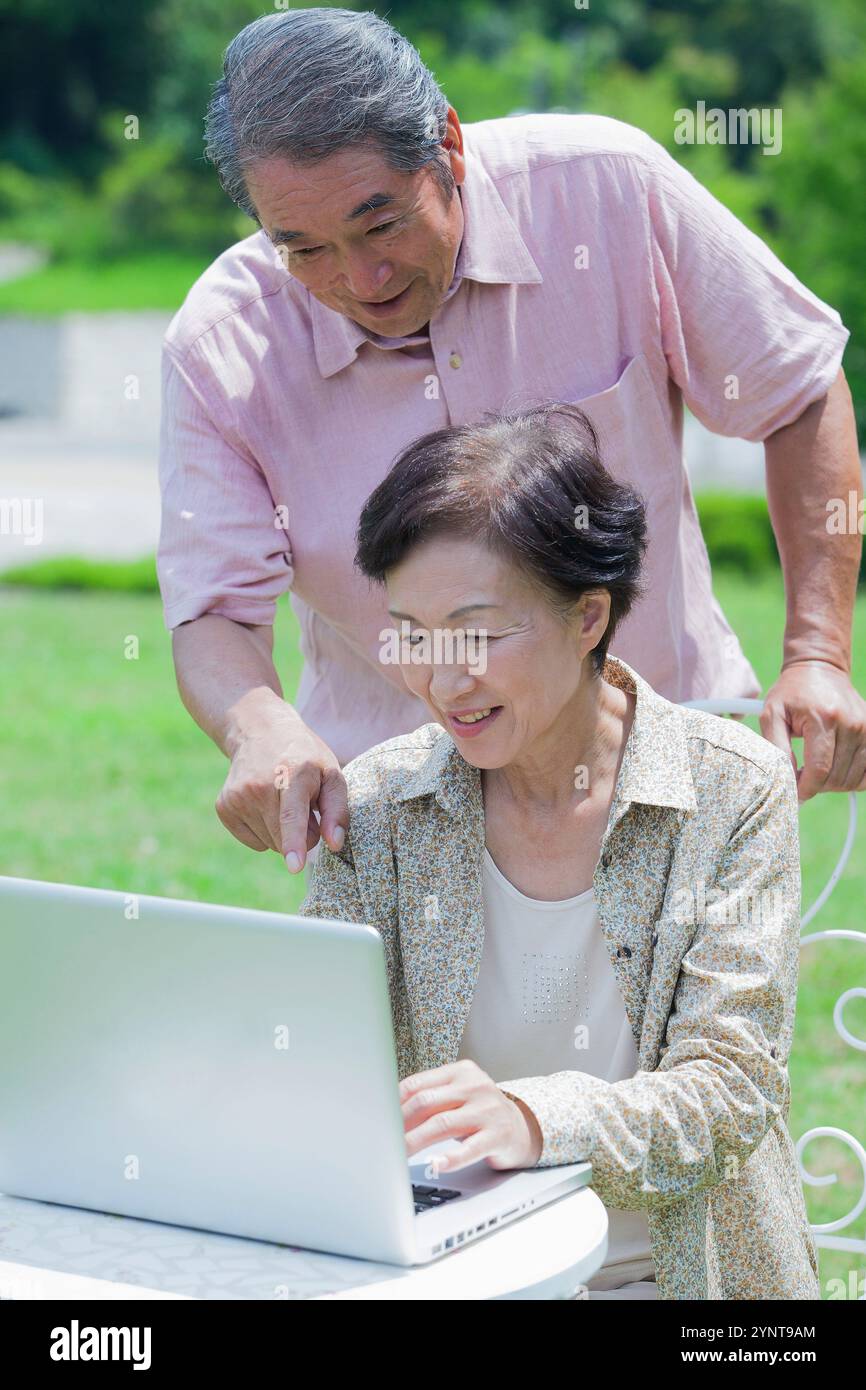 Grandmother grandfather in computer hi-res stock photography and images ...
