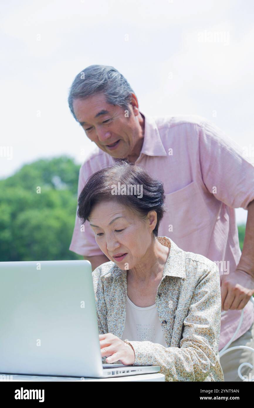 Grandmother grandfather in computer hi-res stock photography and images ...