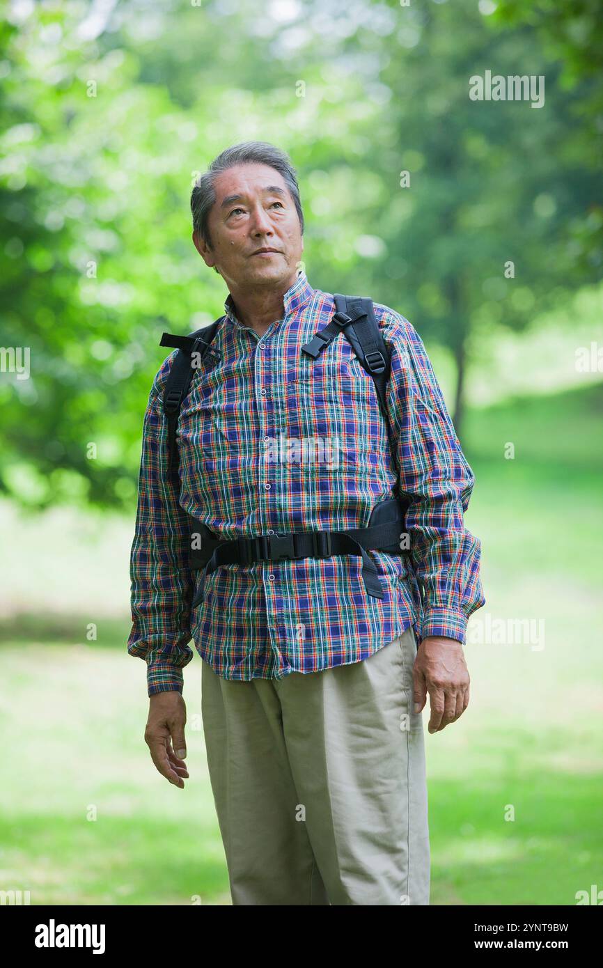 With rucksack on one shoulder hi-res stock photography and images - Alamy