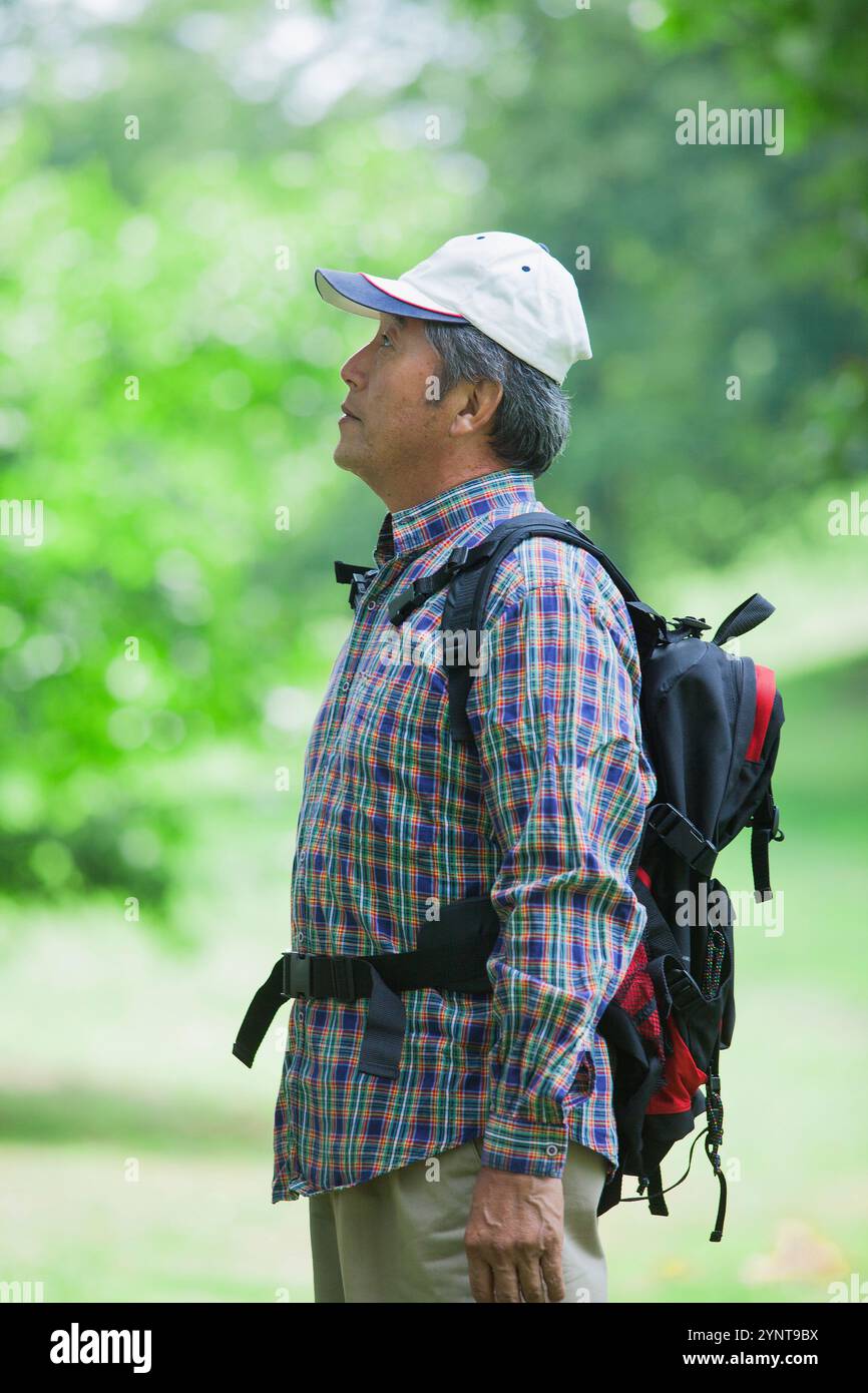 With rucksack on one shoulder hi-res stock photography and images - Alamy