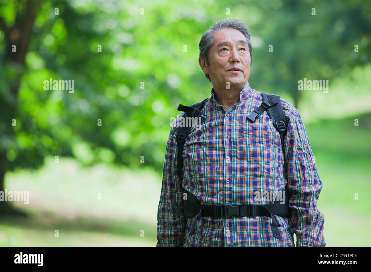 With rucksack on one shoulder hi-res stock photography and images - Alamy