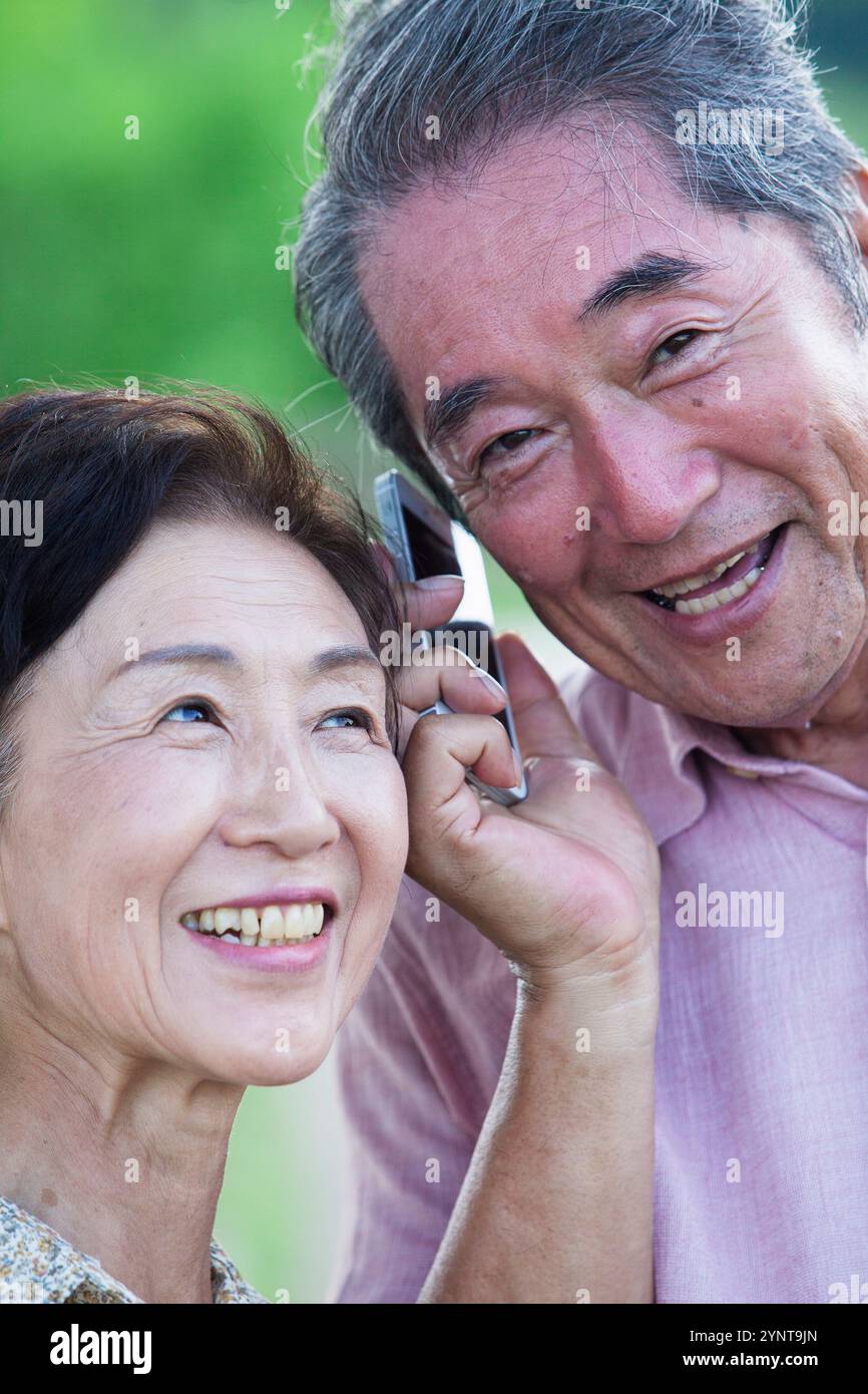 Senior citizen making a phone call Stock Photo - Alamy
