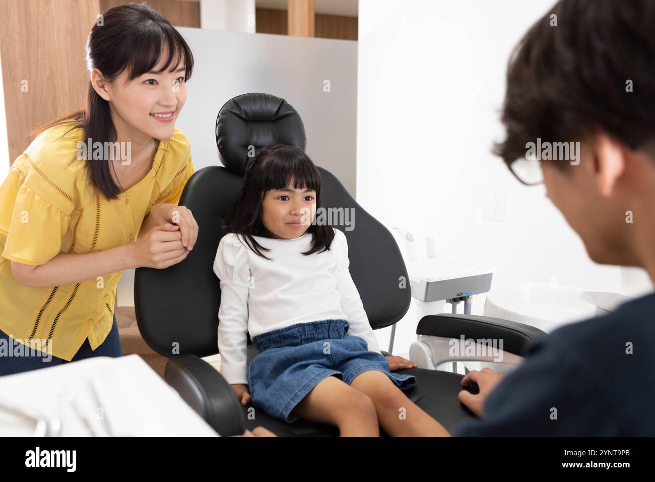 Girl undergoing medical check-up Stock Photo - Alamy