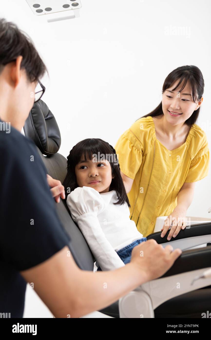 Girl undergoing medical check-up Stock Photo - Alamy