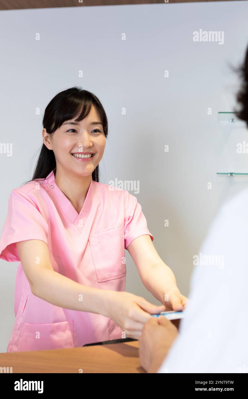 Hospital reception area Stock Photo - Alamy