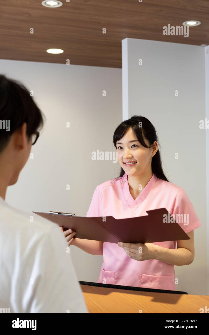 Hospital reception area Stock Photo - Alamy
