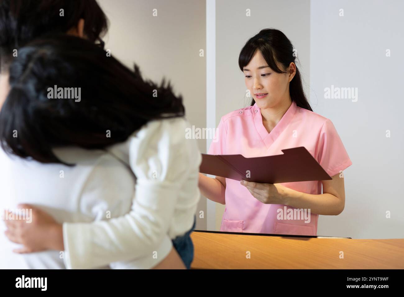 Hospital reception area Stock Photo - Alamy