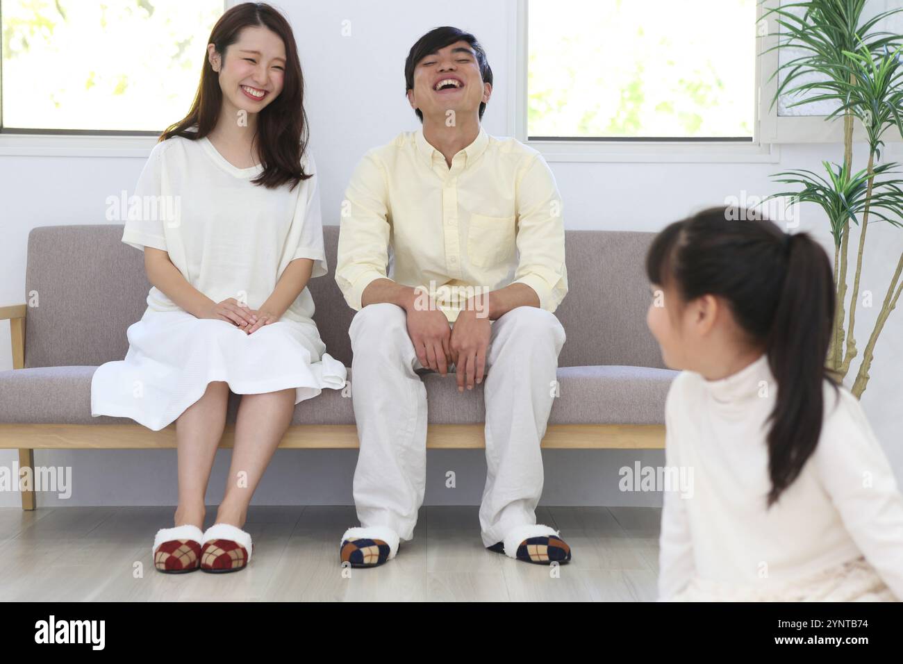 Family in unity Stock Photo - Alamy