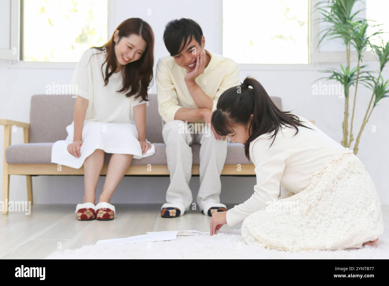 Family in unity Stock Photo - Alamy