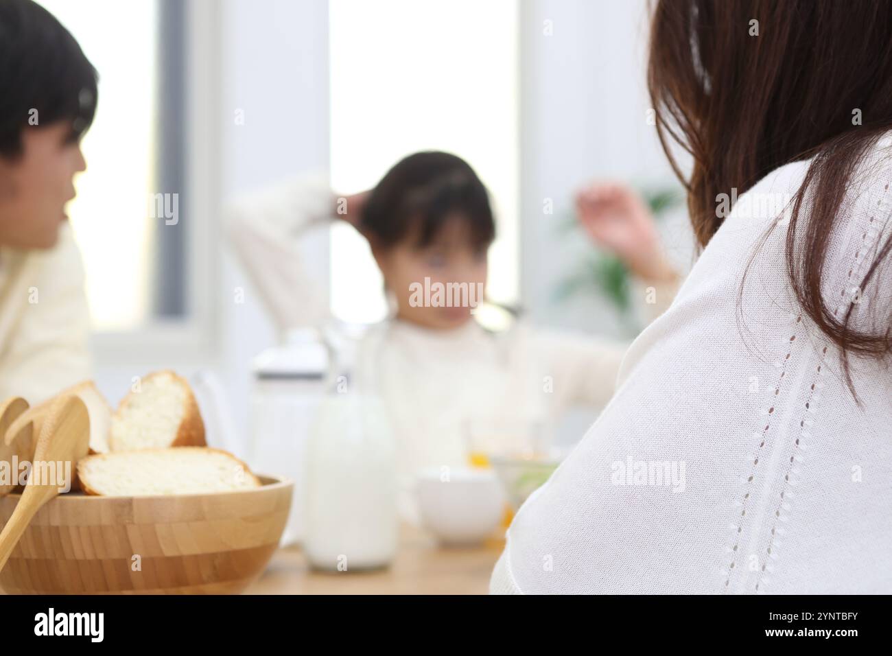 Family eating breakfast Stock Photo - Alamy