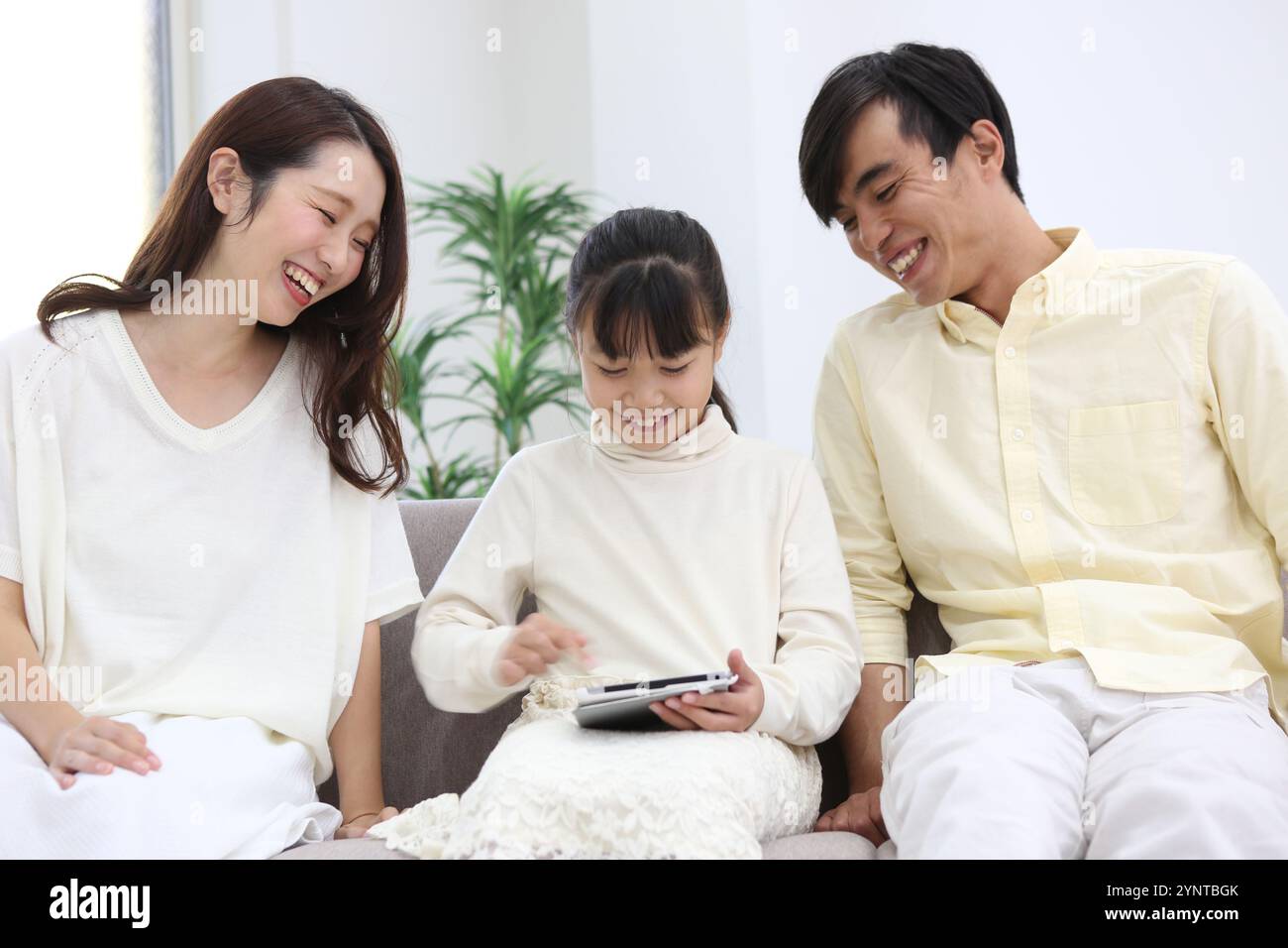Family in unity Stock Photo - Alamy