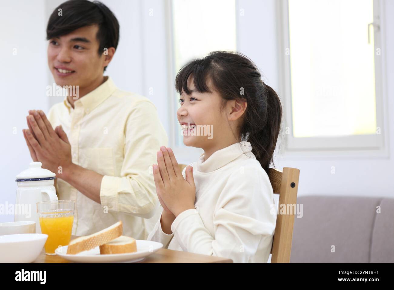 Family eating breakfast Stock Photo - Alamy