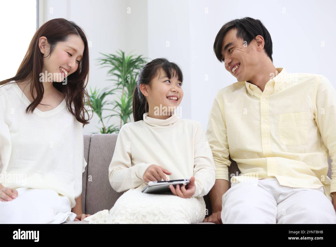 Family in unity Stock Photo - Alamy