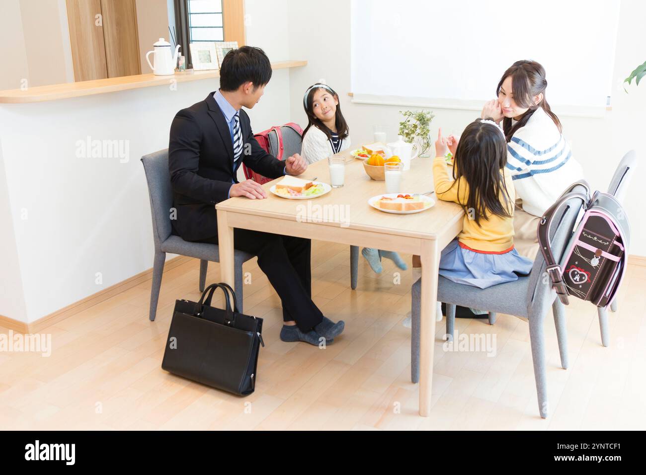 Family breakfast scene Stock Photo - Alamy