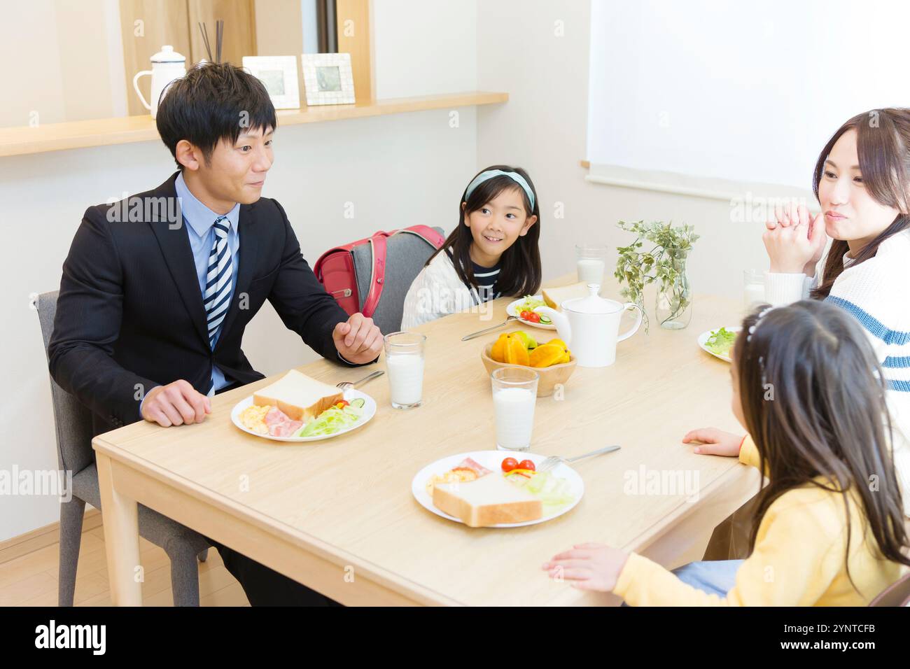Family breakfast scene Stock Photo - Alamy