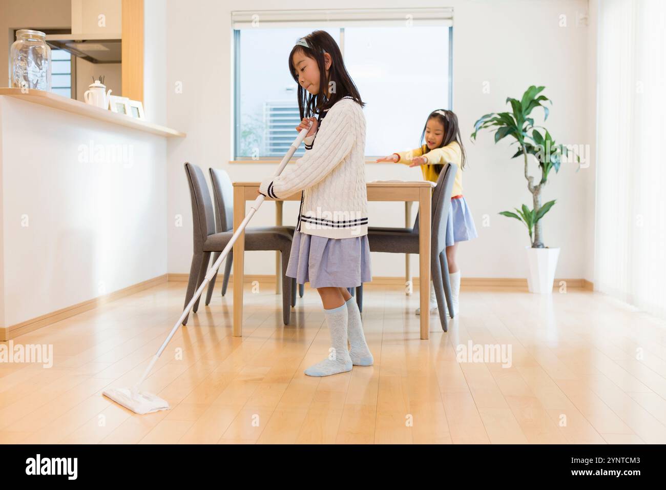 Helping a friend at school hi-res stock photography and images - Alamy