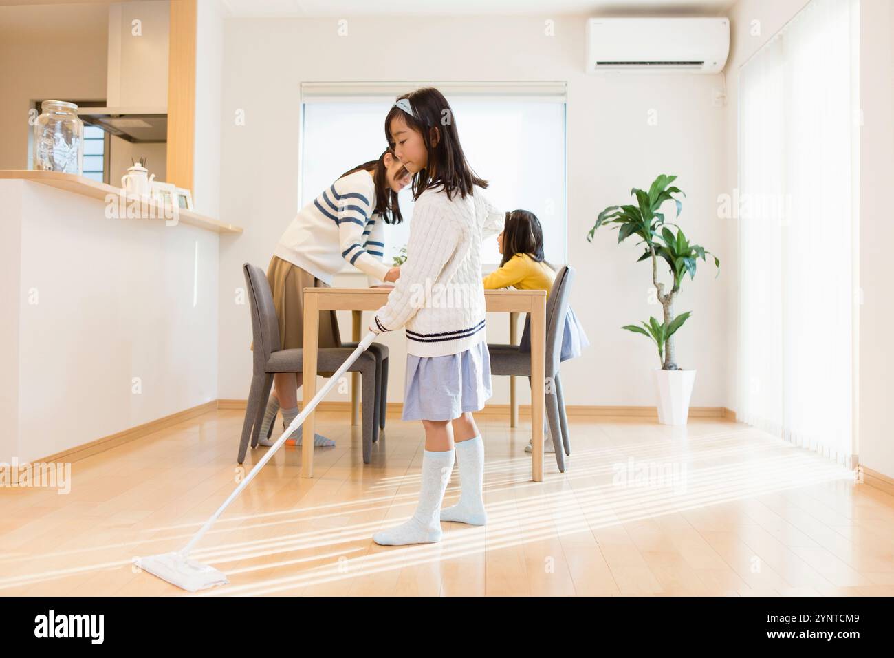 Children helping out Stock Photo - Alamy