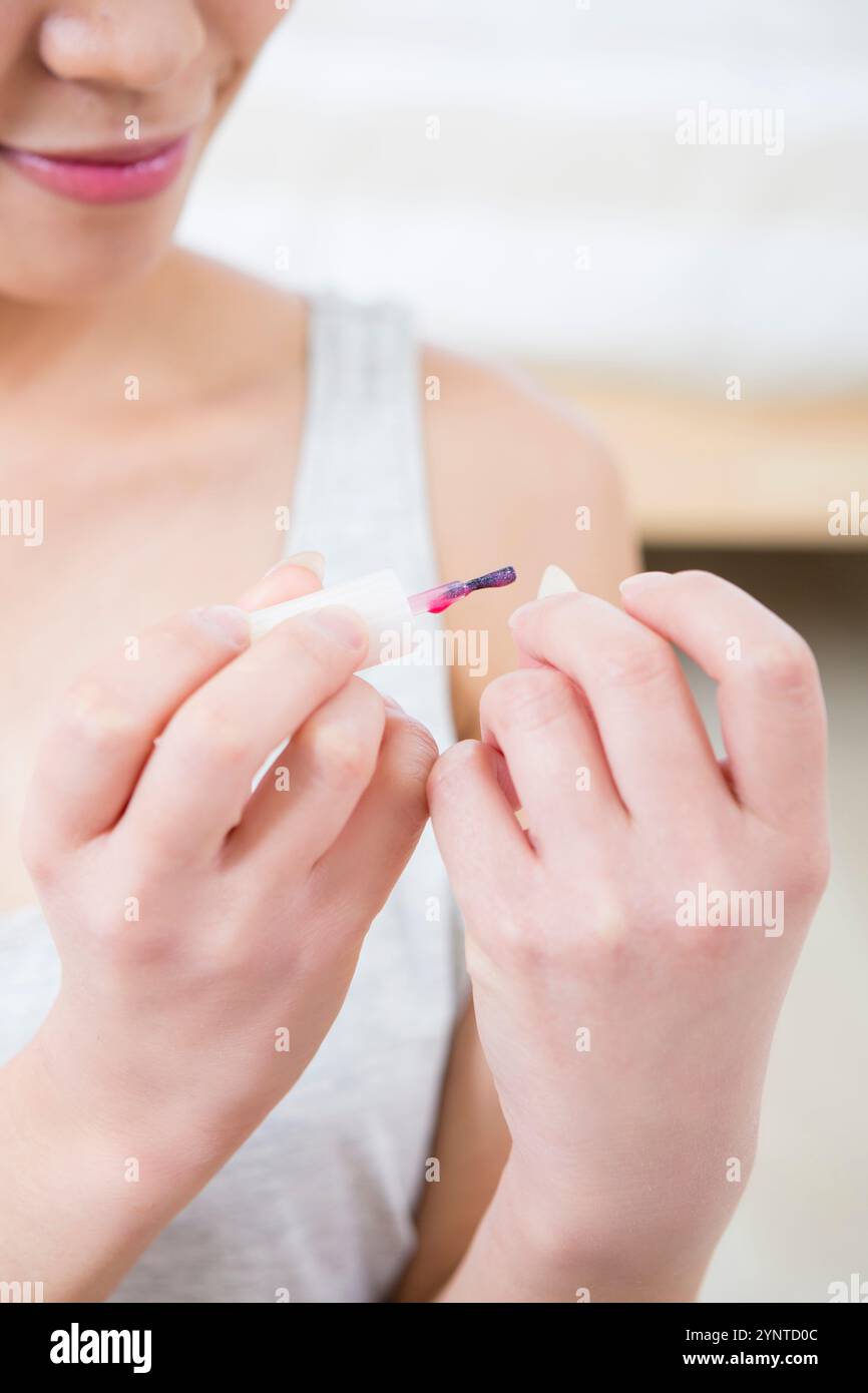 Woman bed nails hi-res stock photography and images - Alamy