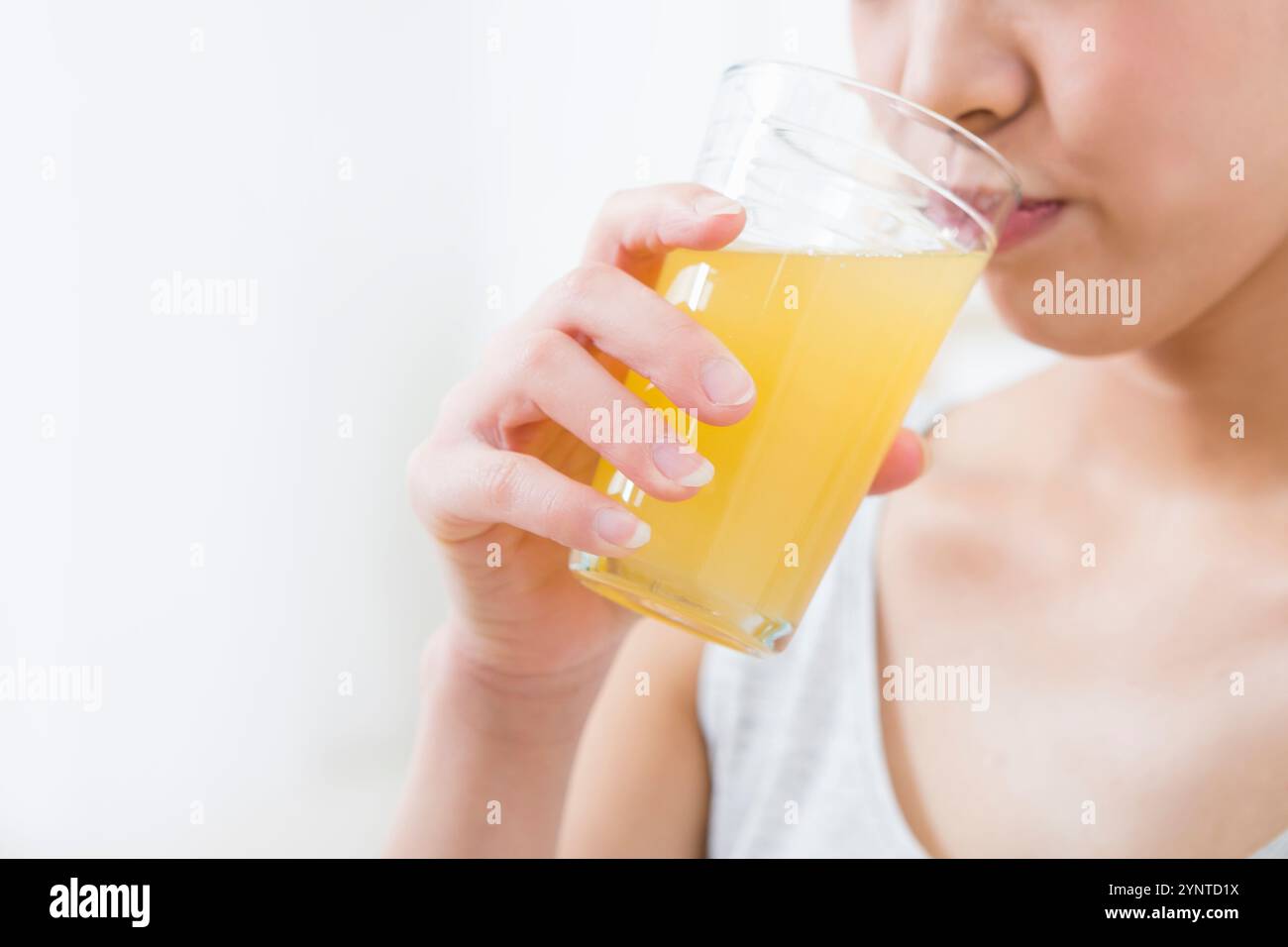 Cute woman drinking glass orange hi-res stock photography and images ...