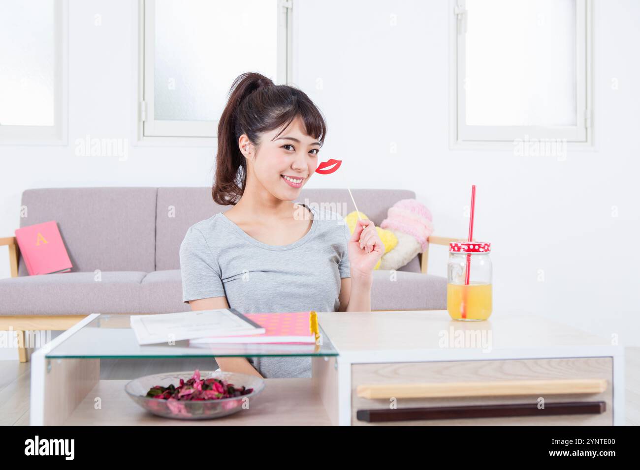 Woman playing with paper craft Stock Photo - Alamy