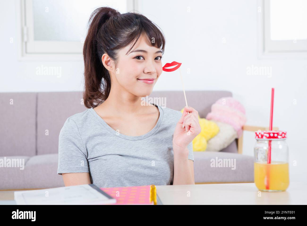 Woman playing with paper craft Stock Photo - Alamy