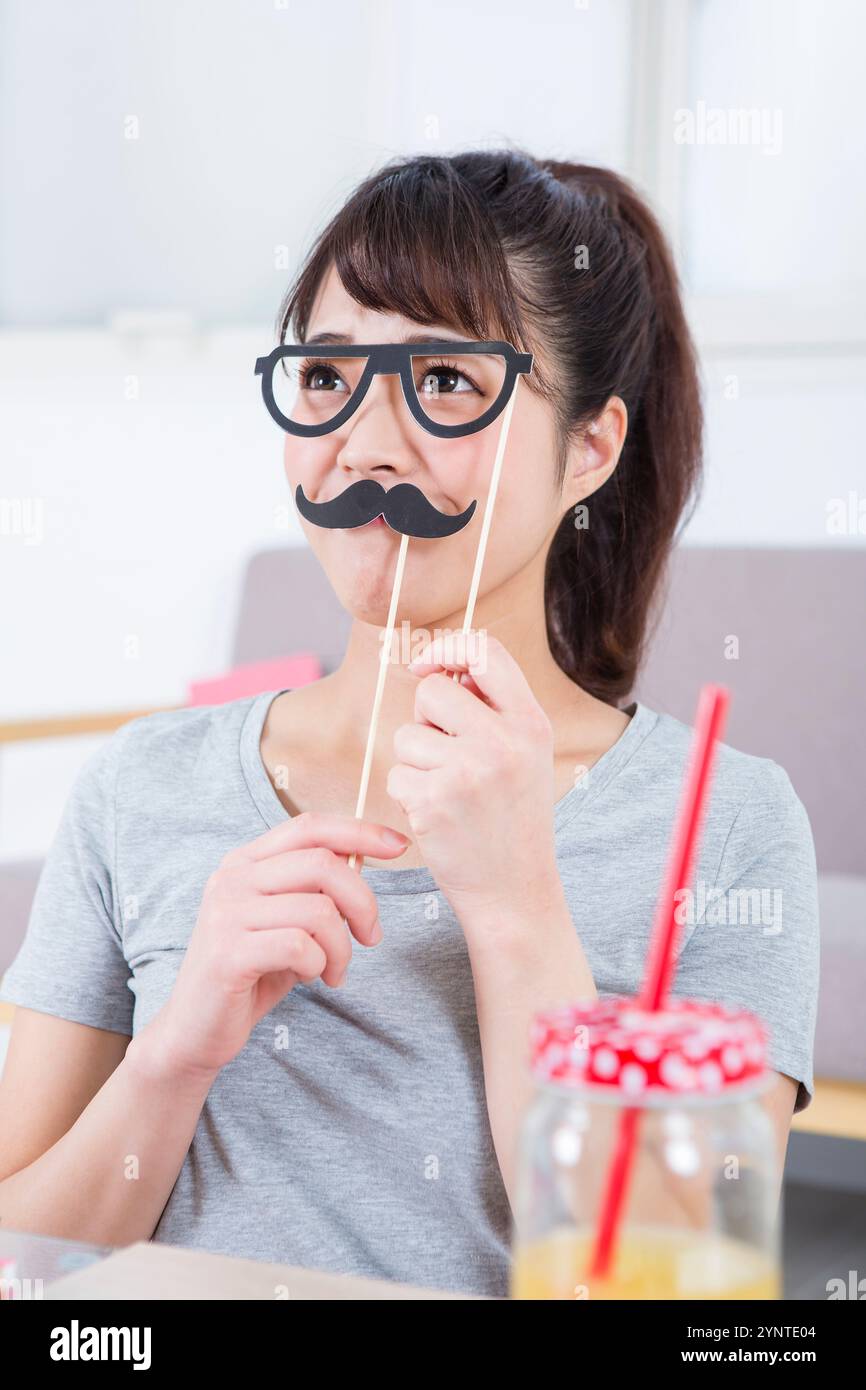 Woman playing with paper craft Stock Photo - Alamy