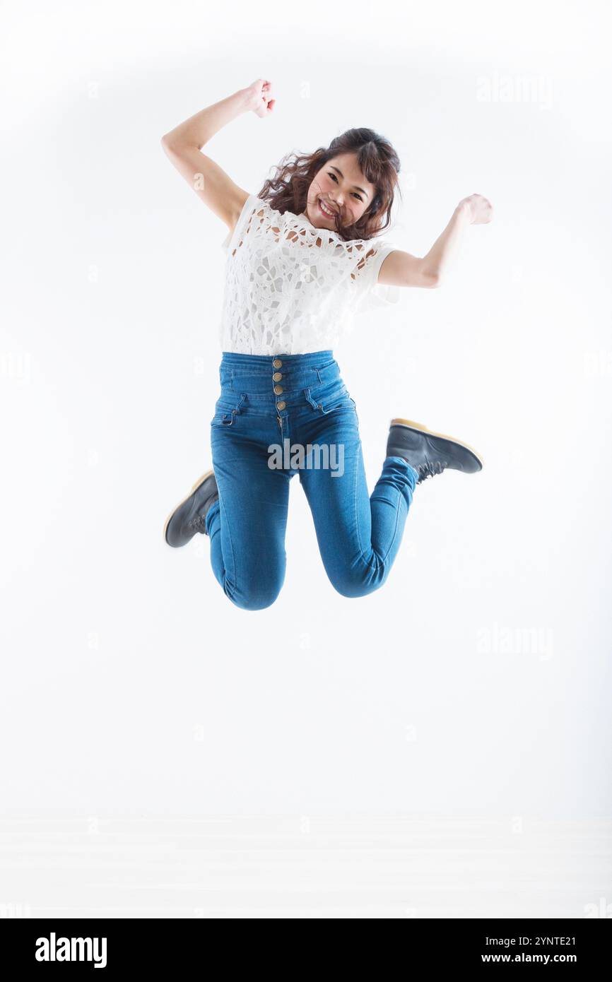 Japanese women jumping for hi-res stock photography and images - Alamy