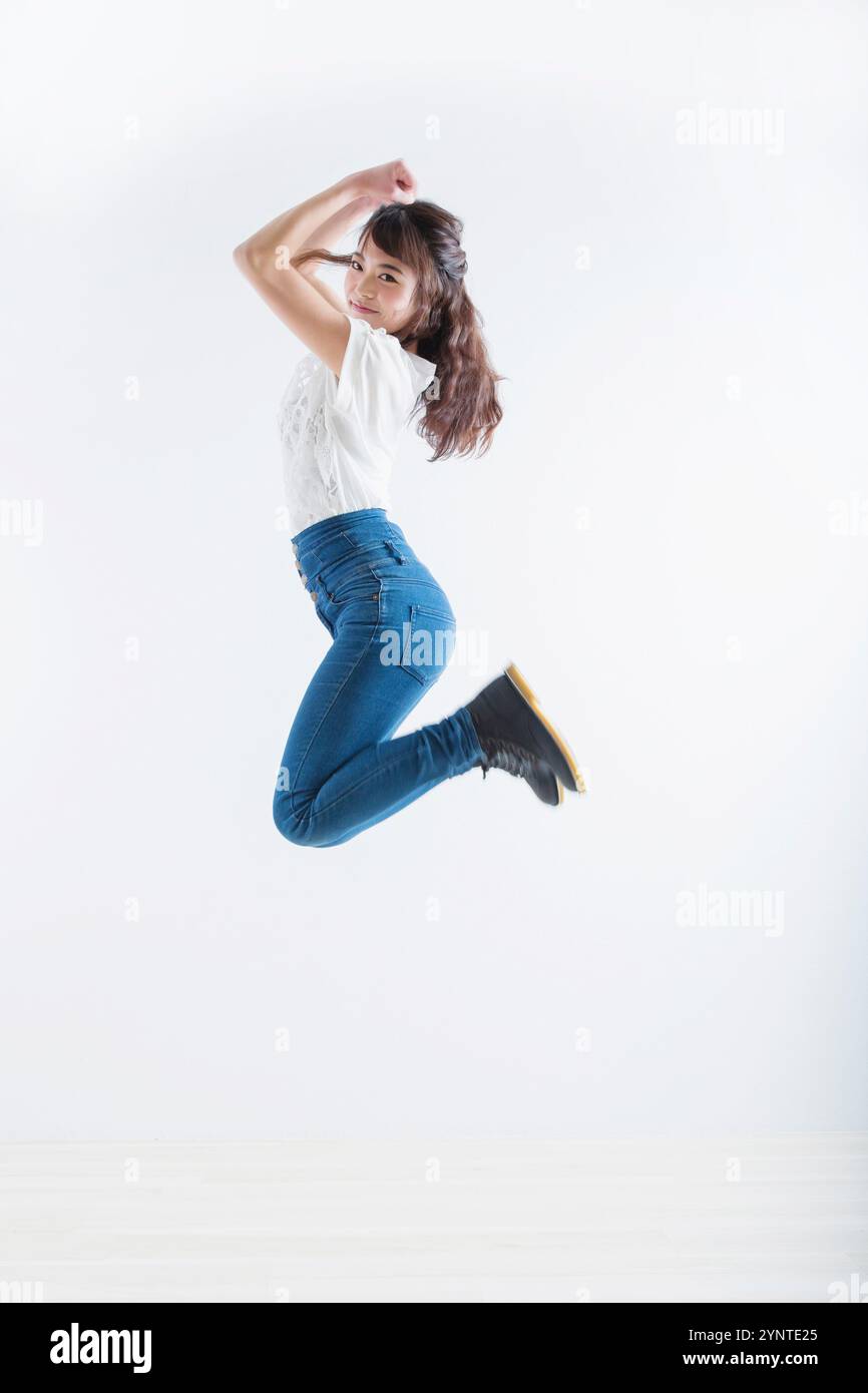 Japanese women jumping for hi-res stock photography and images - Alamy
