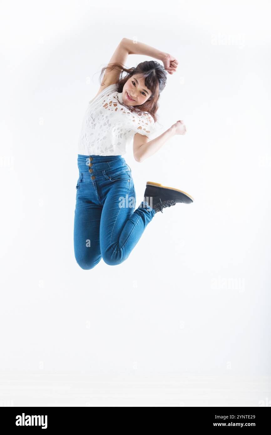 Japanese women jumping for hi-res stock photography and images - Alamy