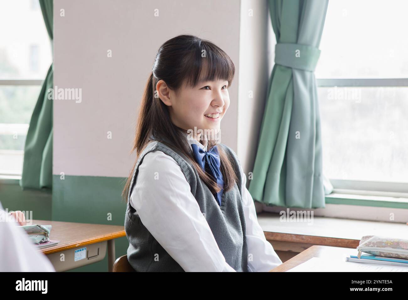 Female students in class Stock Photo - Alamy