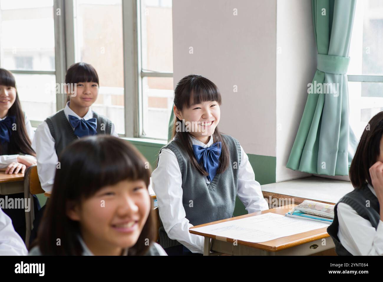 Female students in class Stock Photo - Alamy