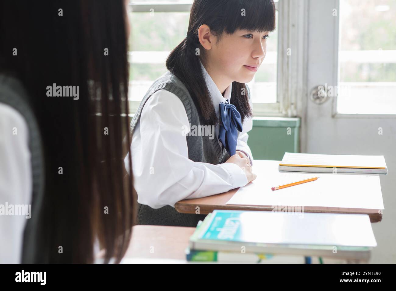 Female students in class Stock Photo - Alamy