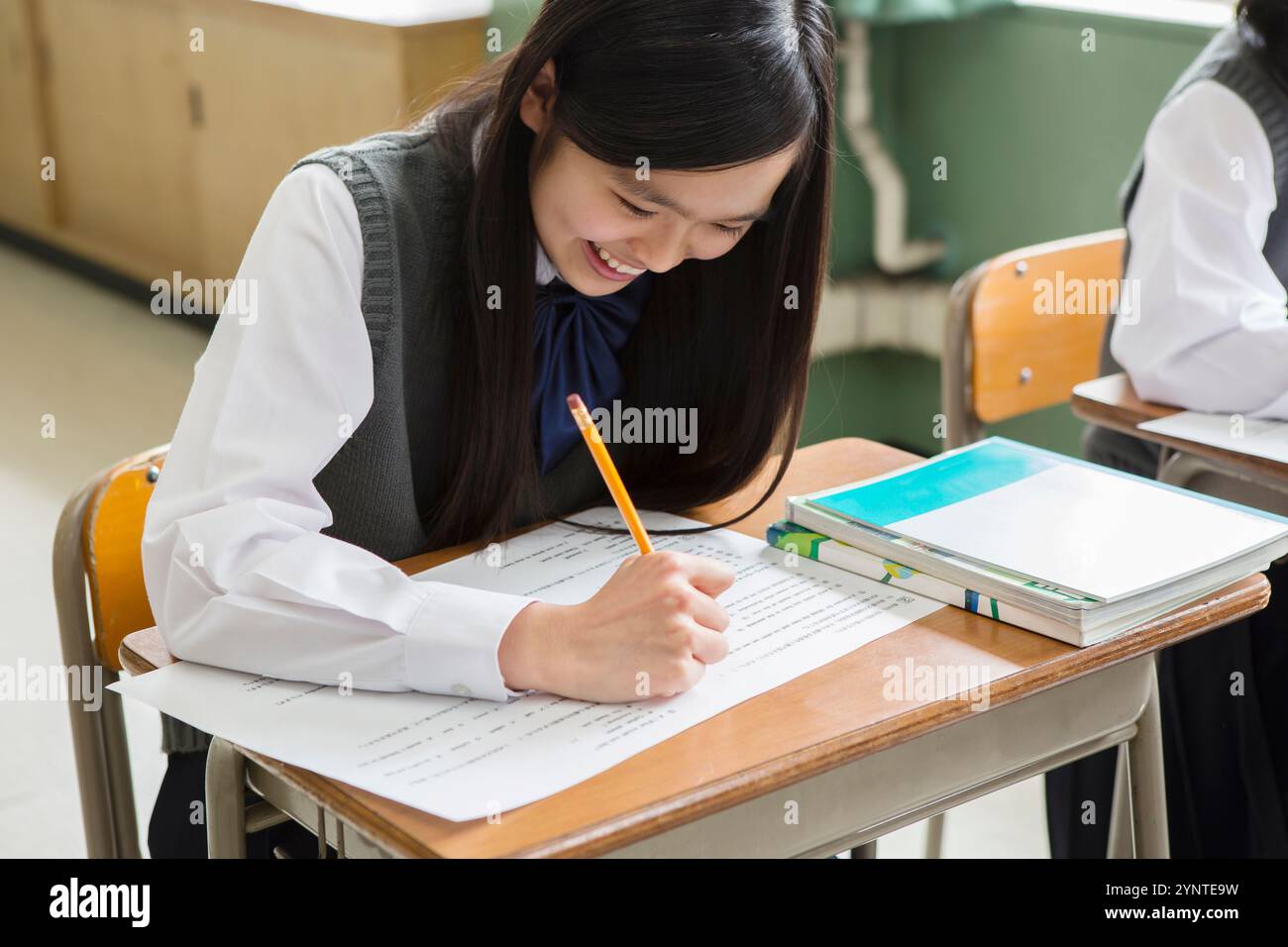 Female students in class Stock Photo - Alamy