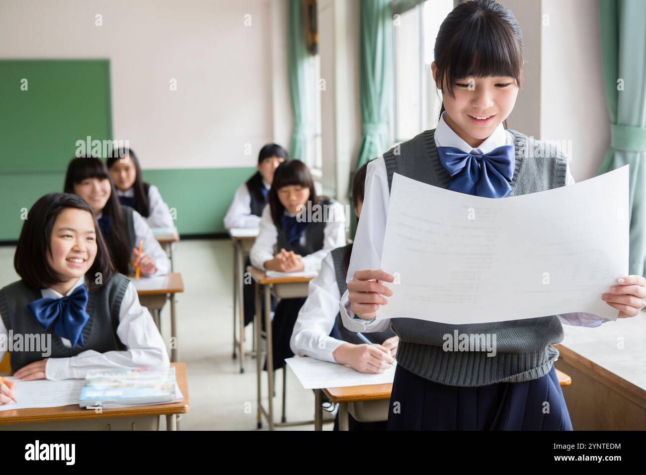 Female student making a presentation Stock Photo - Alamy