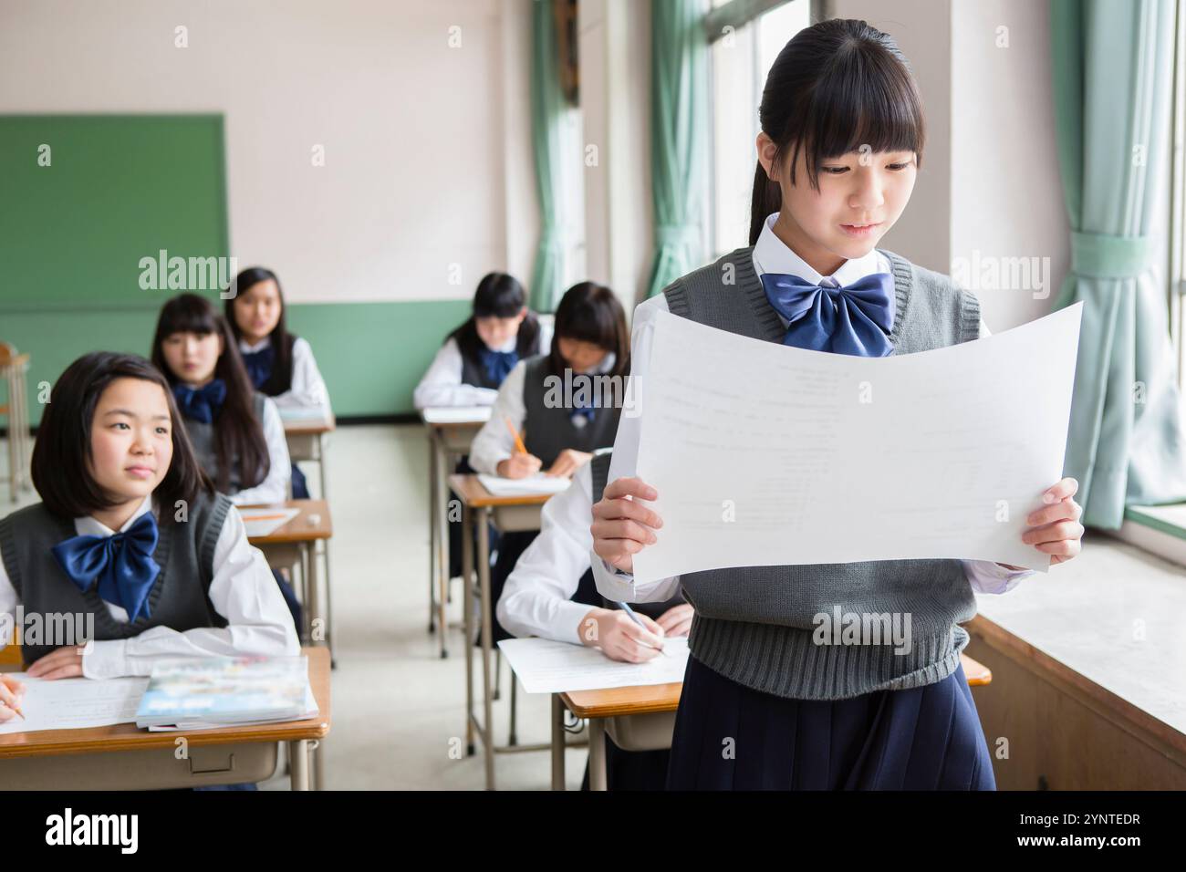 Female student making a presentation Stock Photo - Alamy