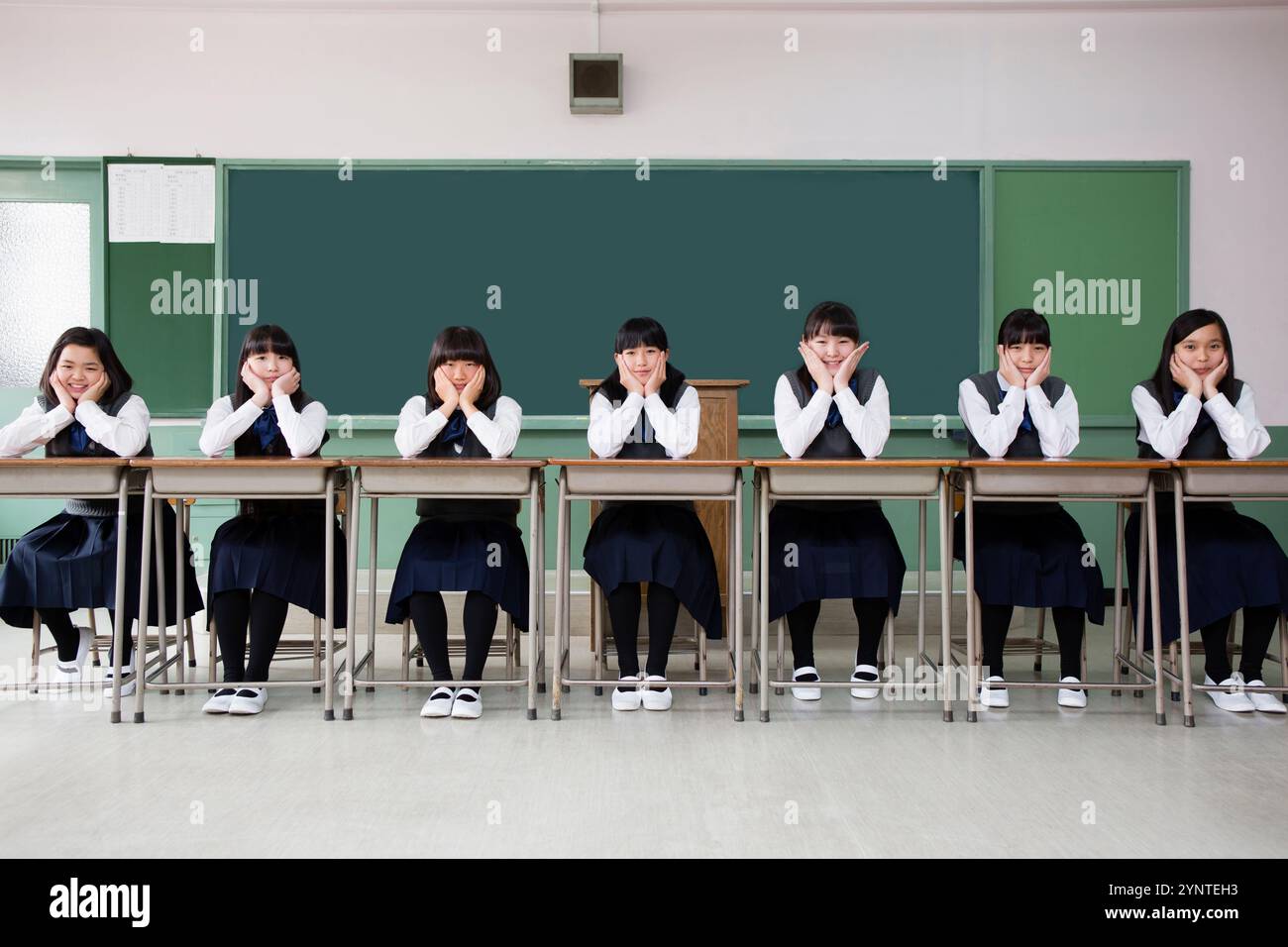 Desks and chairs in a classroom hi-res stock photography and images - Alamy