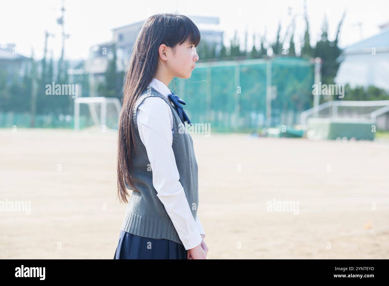 Female student standing Stock Photo - Alamy