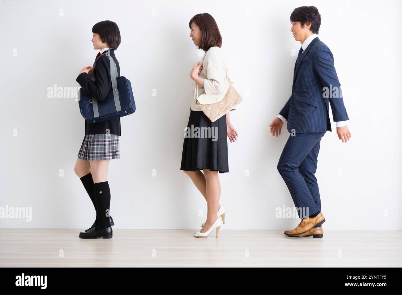 Family family line up hi-res stock photography and images - Alamy