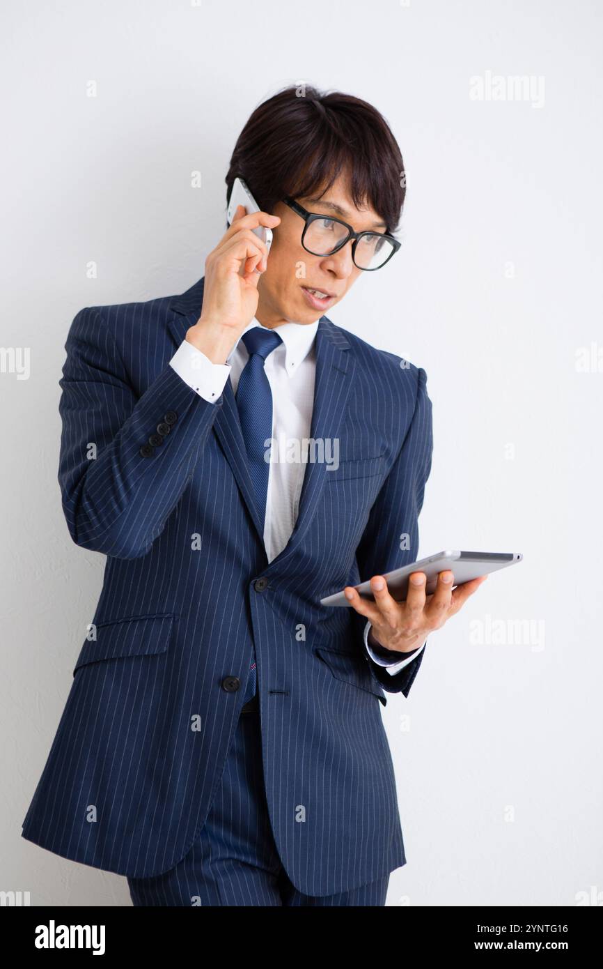 Whole family making phone call hi-res stock photography and images - Alamy
