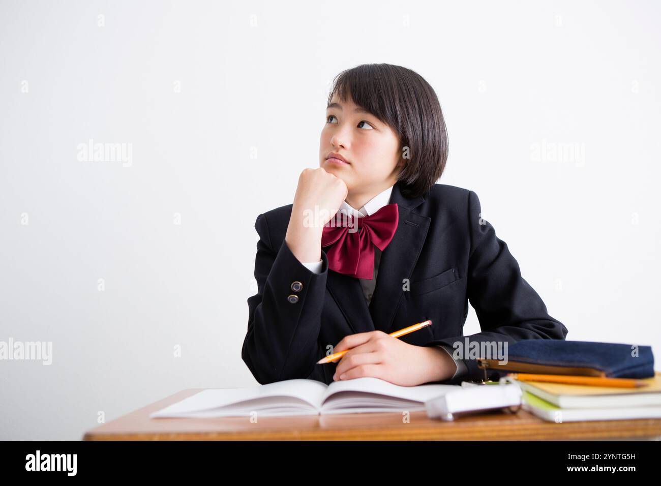 Thinking high school girls Stock Photo - Alamy