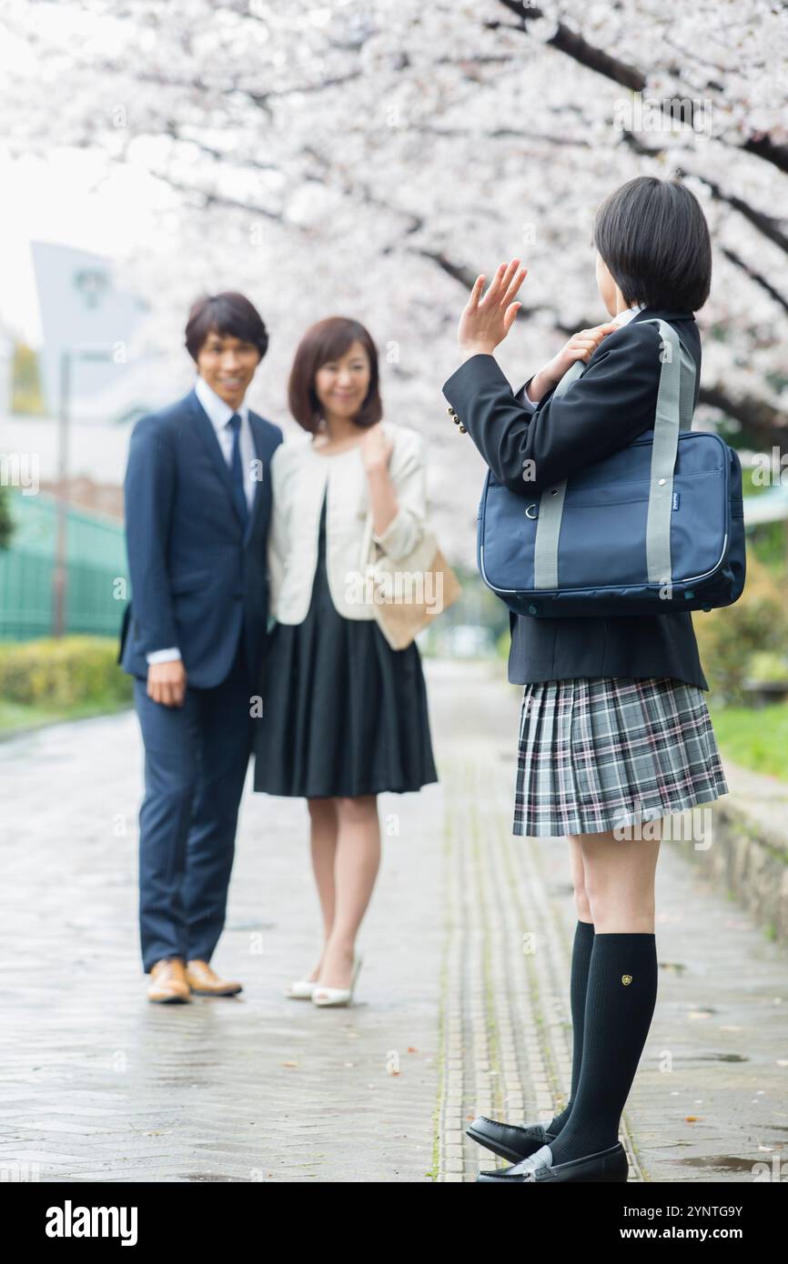 Child going to school waving hi-res stock photography and images - Alamy