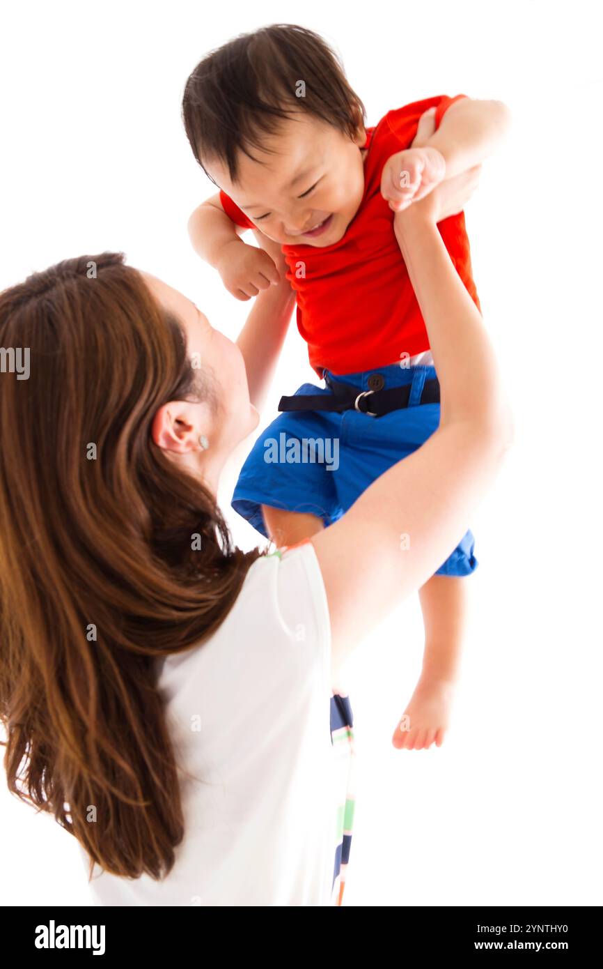 Mothers raising children Stock Photo - Alamy