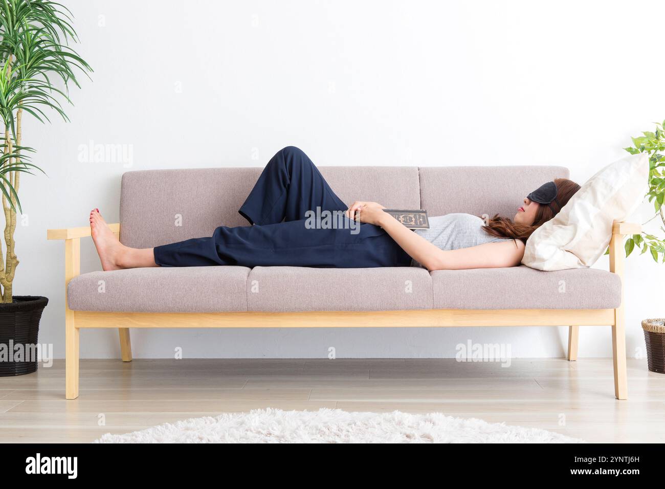 Woman taking a nap Stock Photo - Alamy