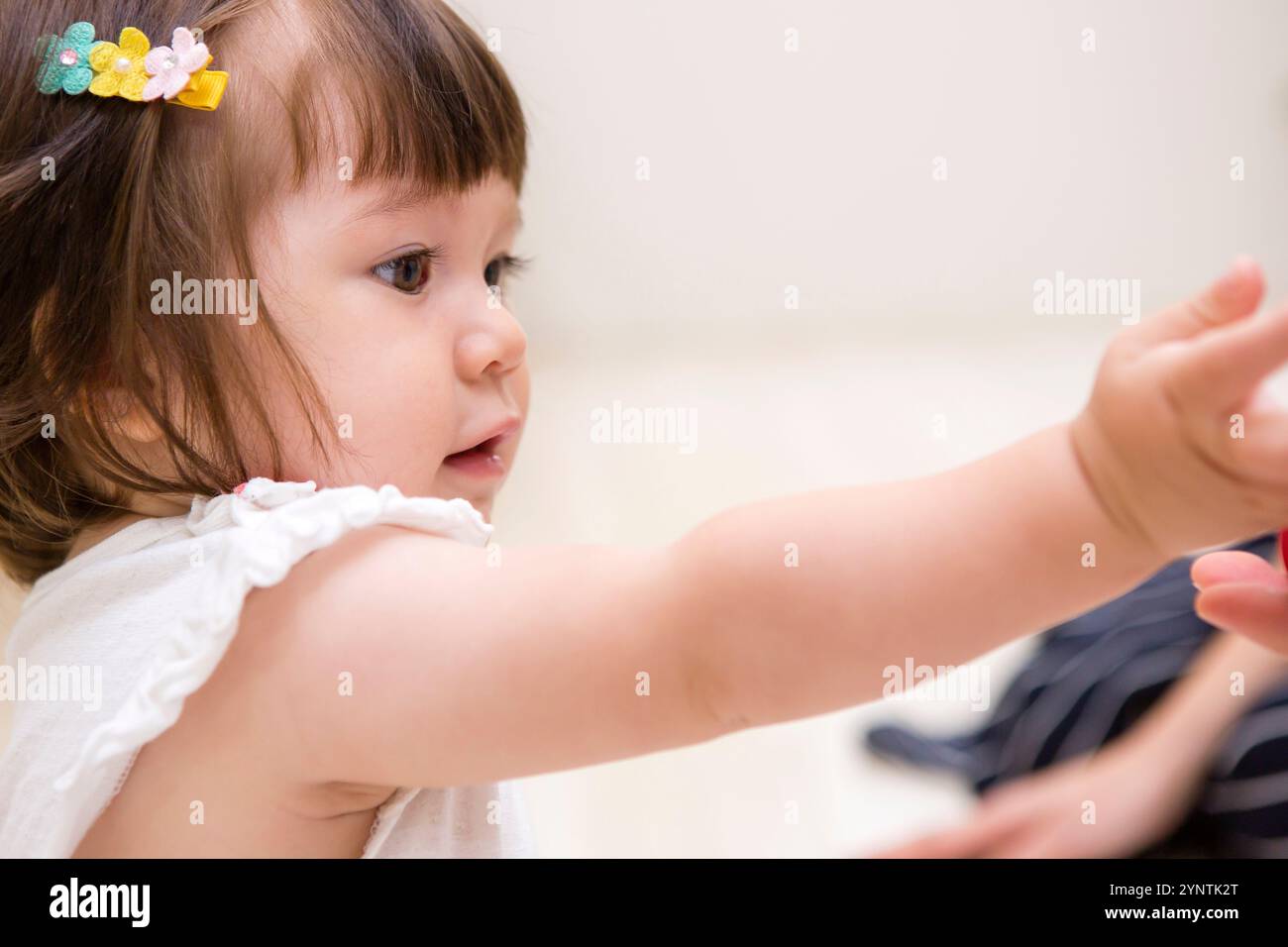 Hand reaching out child hi-res stock photography and images - Alamy