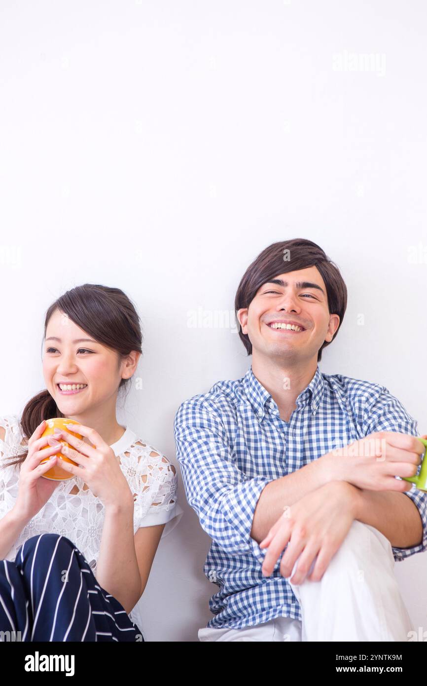 Men and women sitting side by side Stock Photo - Alamy Men and women sitting side by side Stock Photo - Alamy