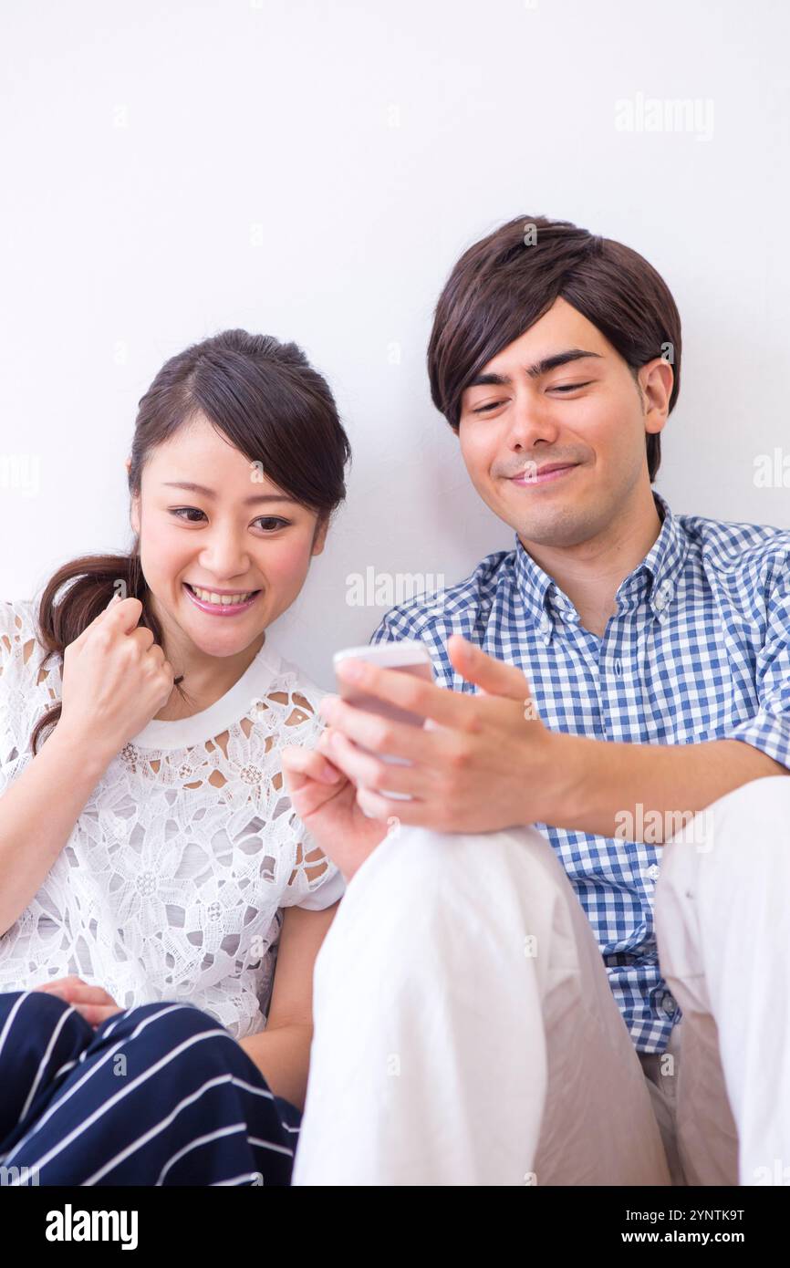 Men and women sitting side by side Stock Photo - Alamy Men and women sitting side by side Stock Photo - Alamy