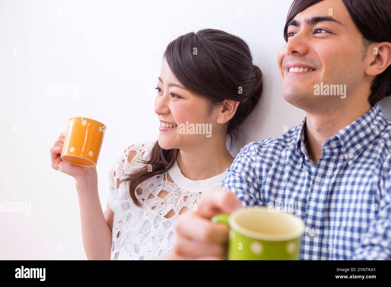Men and women sitting side by side Stock Photo - Alamy Men and women sitting side by side Stock Photo - Alamy