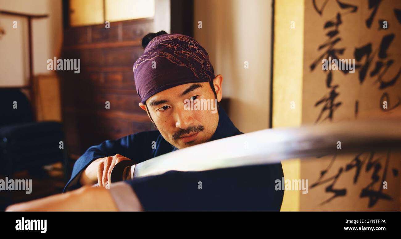 Dojo, form and sword with Samurai man in Japan for combat, martial arts ...